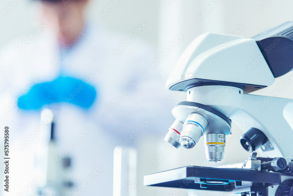 Science microscope equipment in biology chemical laboratory. Scientific ...