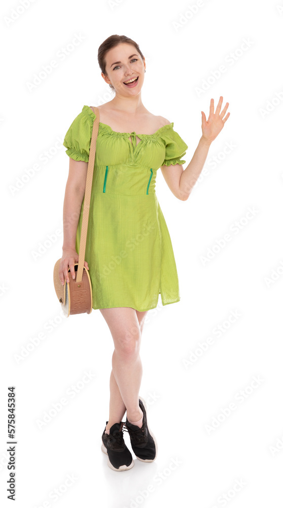 Full length portrait of sociable cheerful friendly girl in green dress ...