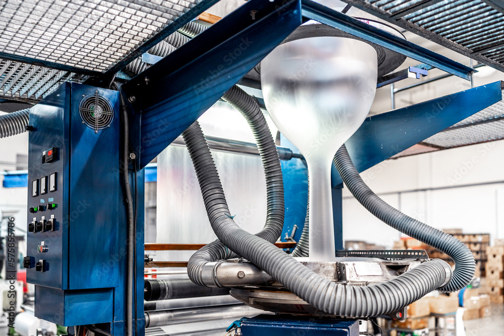 production of plastic packaging in a factory on an automated line Stock ...