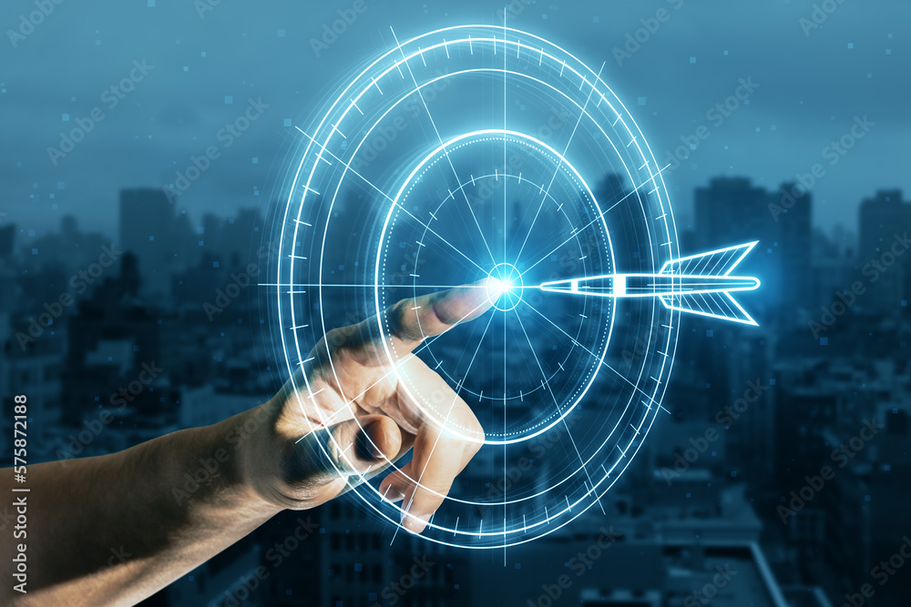 Target concept with a glowing hologram of bullseye and arrow hitting ...