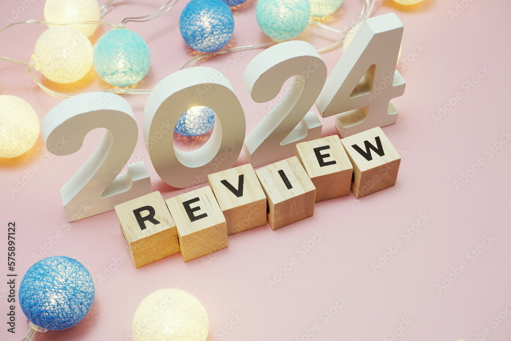 Review 2024 word alphabet letters on pink background Stock Photo ...
