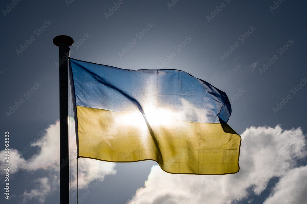 The flag of Ukraine with blue and yellow colour visible against the the ...