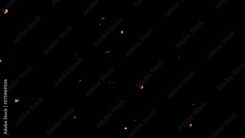 Fire burn ash or dust particles, flying and floating on air in a loop ...