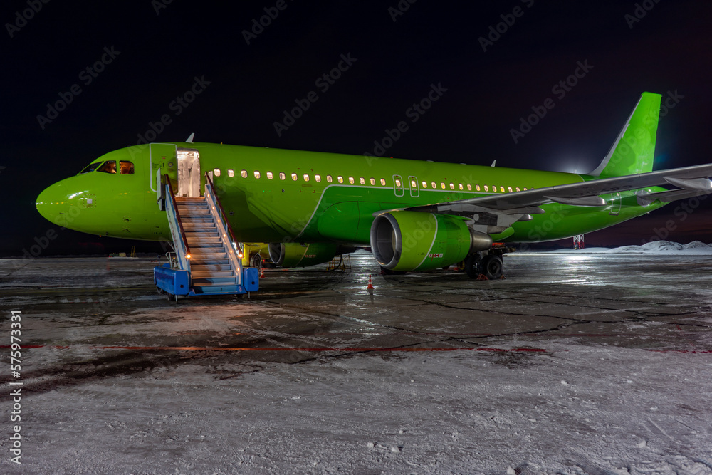 Close-up with high detail of a large wide-body passenger aircraft ...