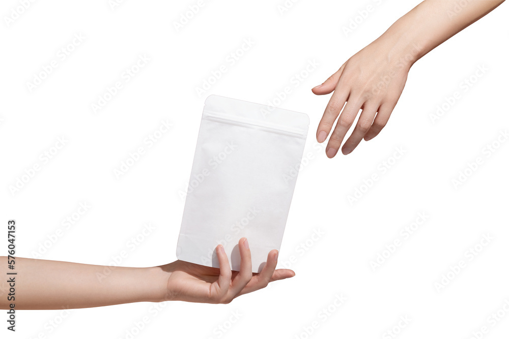 Female hand holds white cardboard packaging for tea/coffee/snack on ...