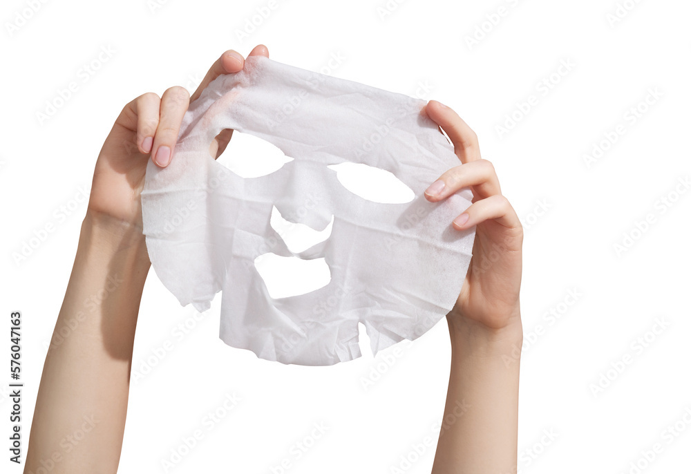 Female hands holding sheet of white mask on transparent background ...
