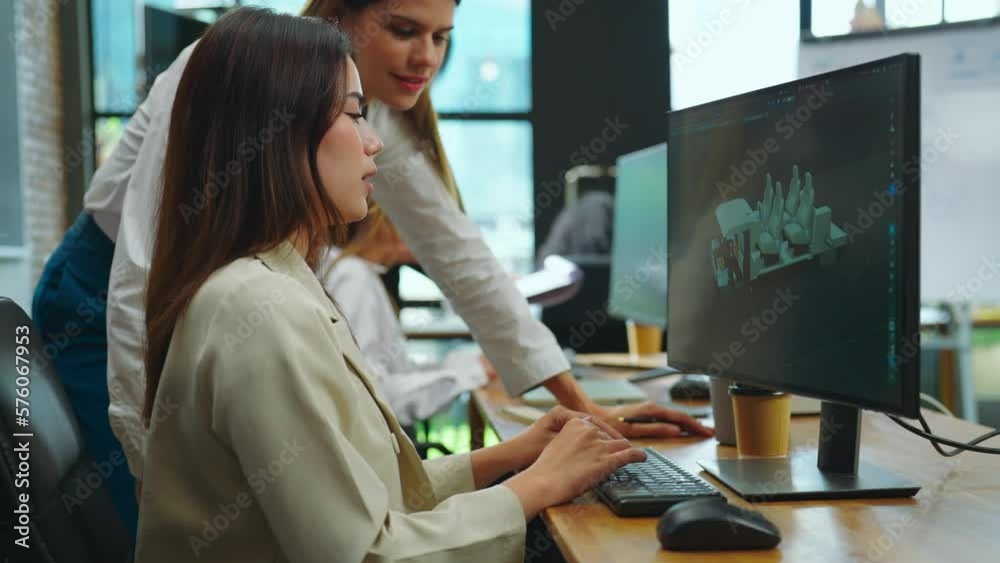 Female designer using computer to design ev car prototype at office ...