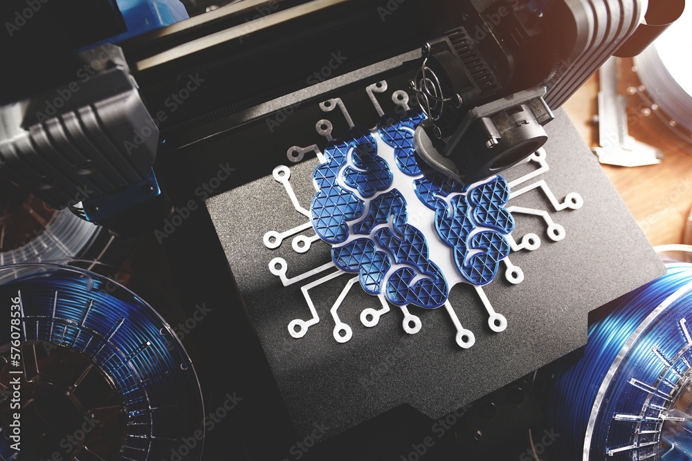 3d printer produces blue brain sculpture in workspace with warm ...