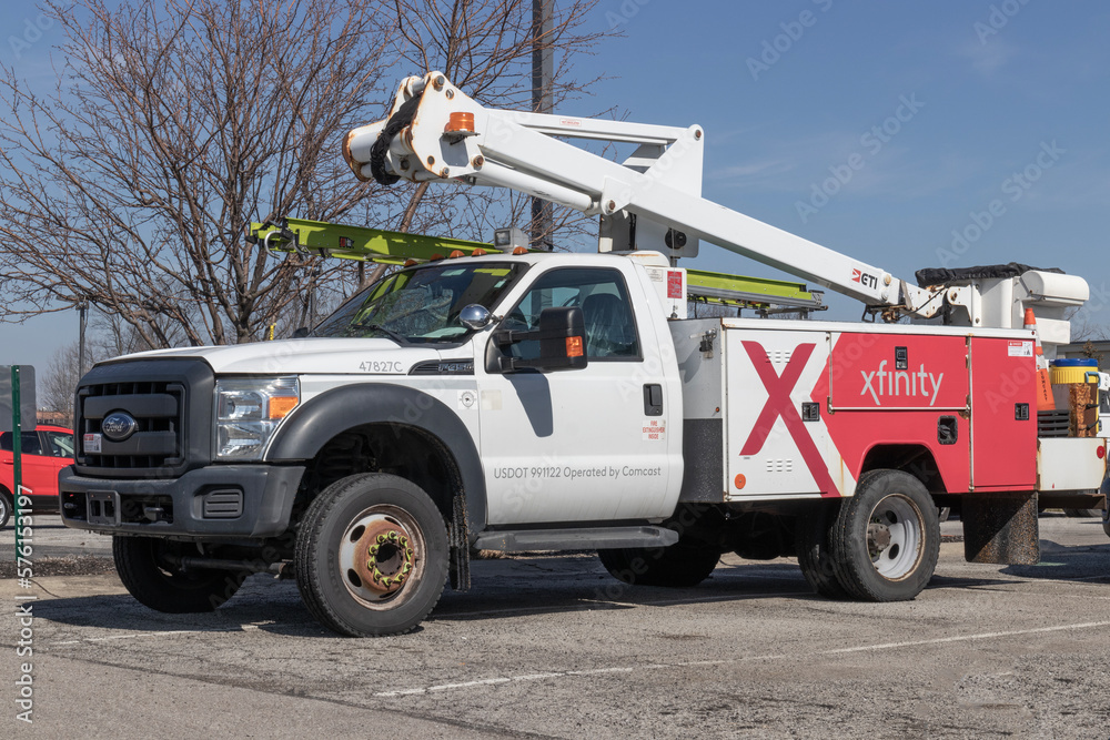 Xfinity branded Comcast bucket truck. Comcast owns NBCUniversal ...
