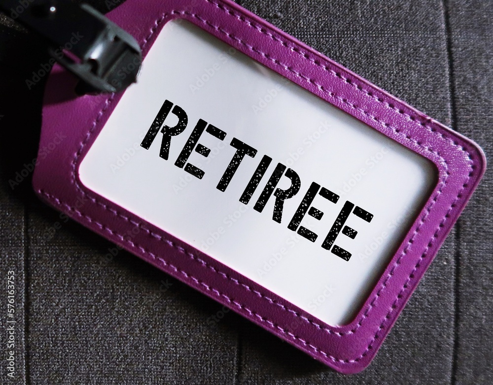 Foto de Purple employee ID card with text RETIREE , person who retired ...