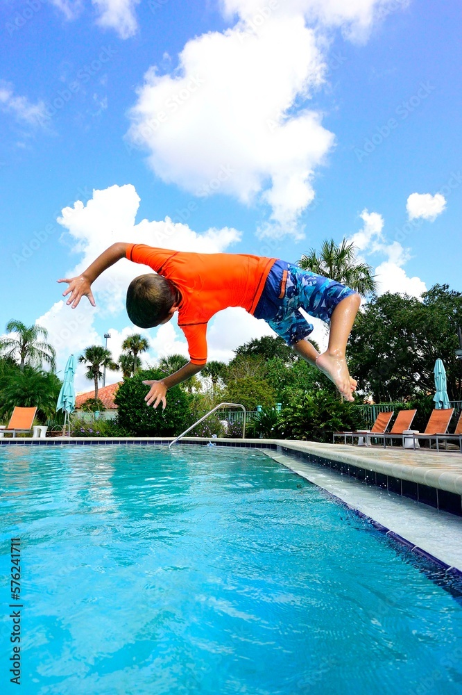kids playing in swimming pool Stock Photo | Adobe Stock