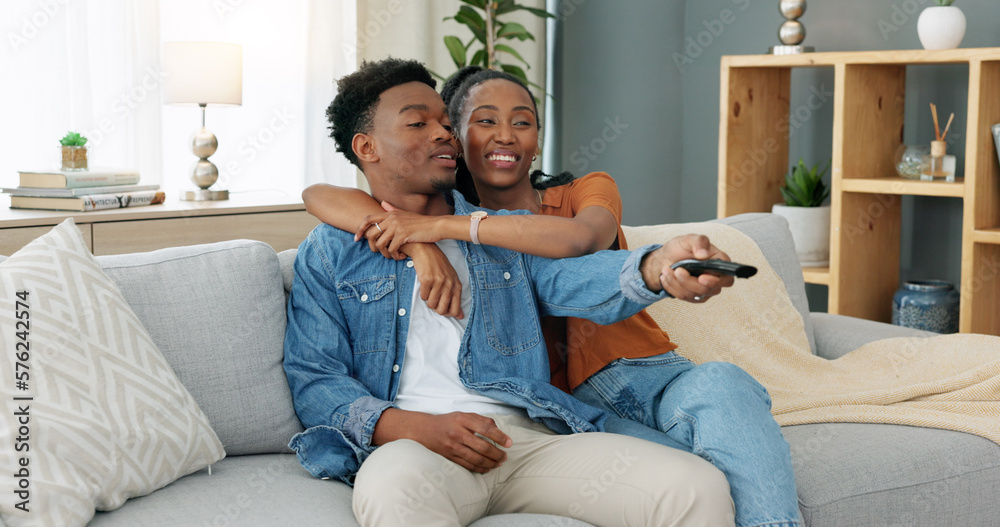 Happy, love and relax couple change channels on tv remote and watching ...