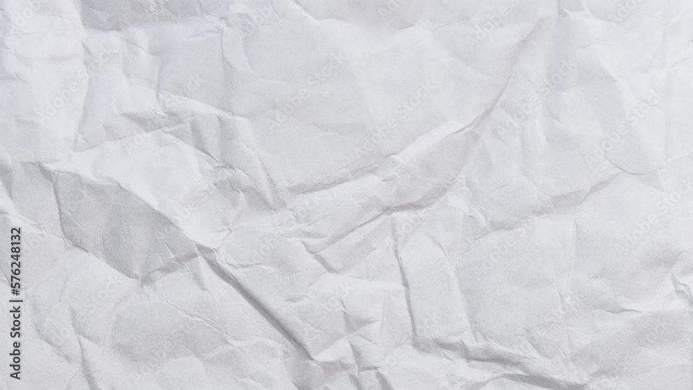 4K Crumpled Paper close-up animation on black background. folding open ...