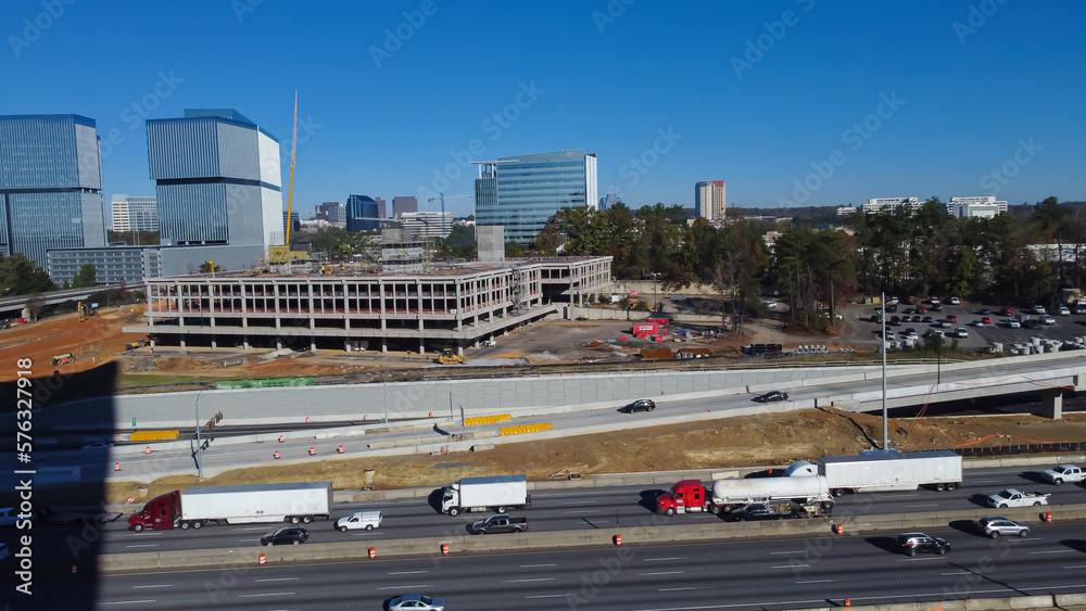 Large construction sites of high-rise office buildings and highway ...