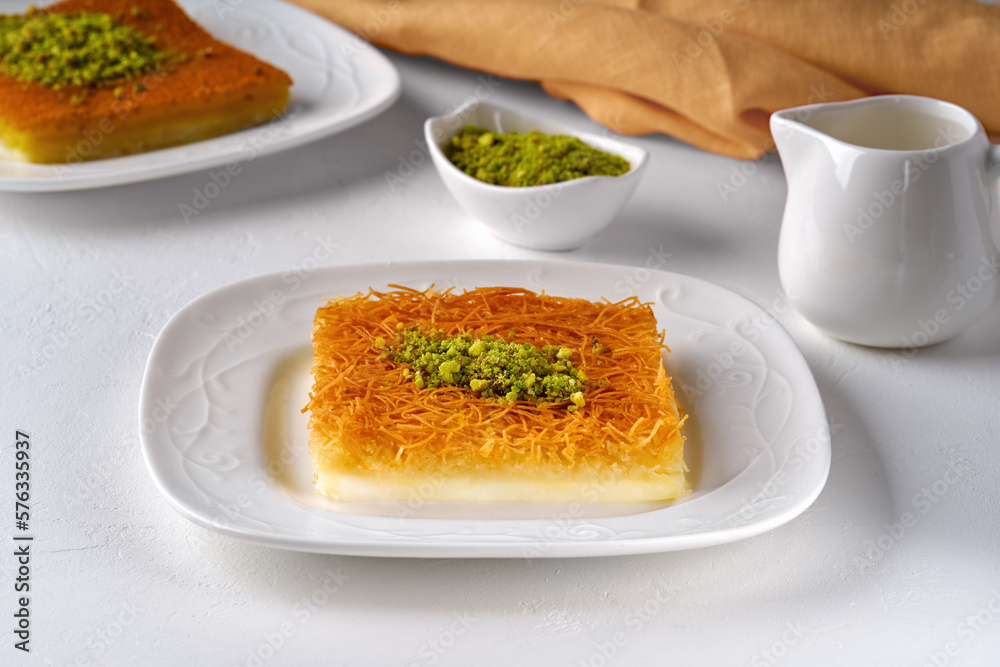Middle eastern sweets kunefe, kunafa, kadayif with pistachio .Turkish ...