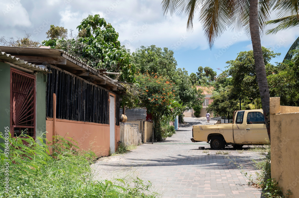 A typical street on the sunny, Caribbean island of Curacao. Stock Photo ...