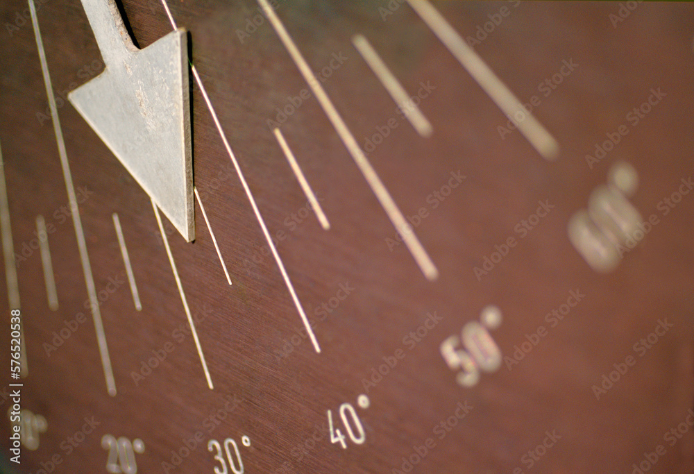 Extreme close up of needle on angle indicator from old construction ...