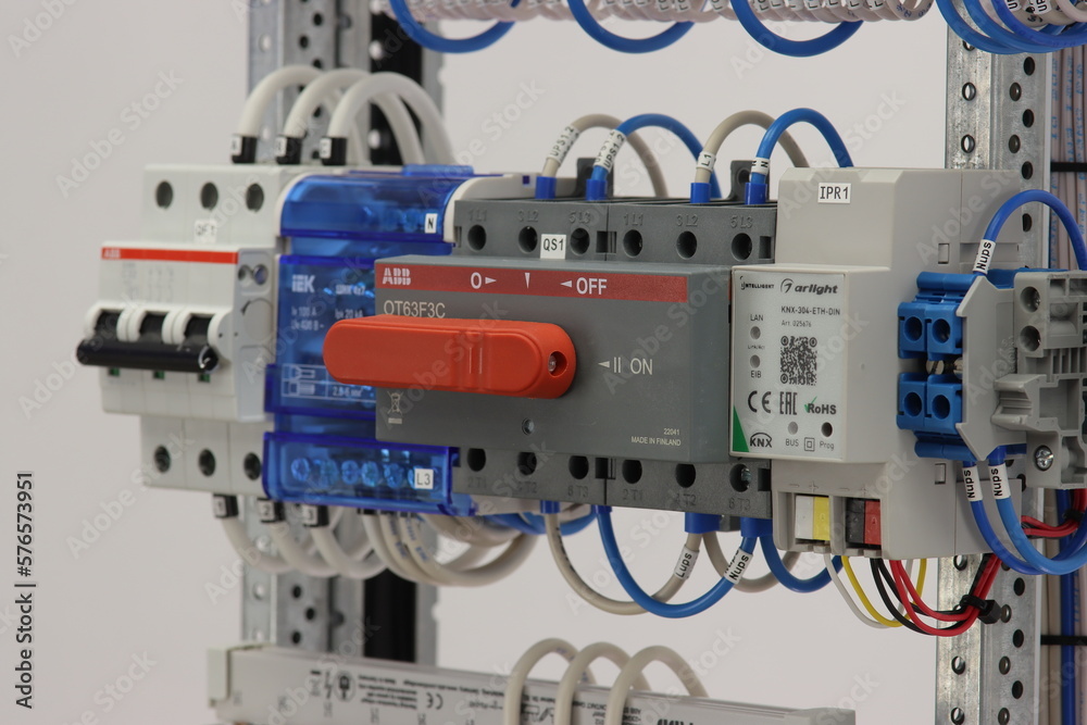 Foto de The ABB reversible switch with a red handle with connected ...