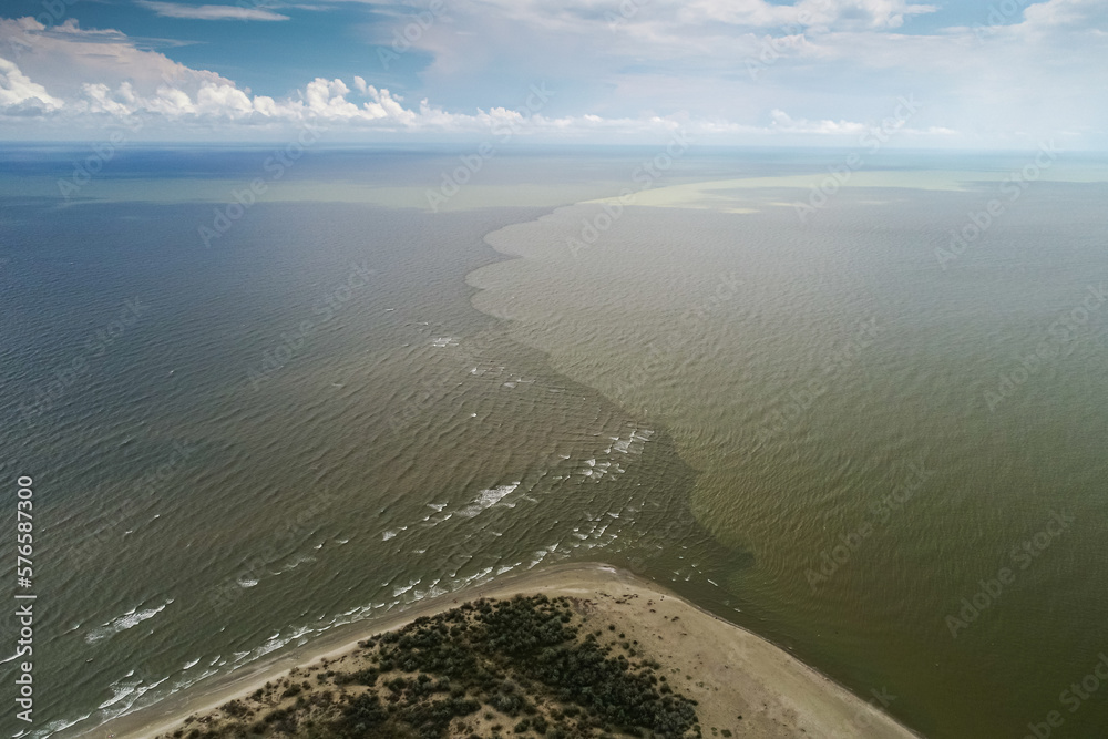 Danube river merge point with Black sea. Aerial view over this iconic ...