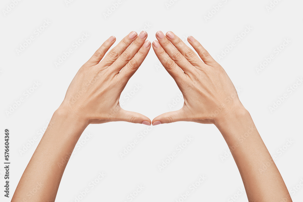 Photo & Art Print Female hands forming a triangle, symbol of women ...