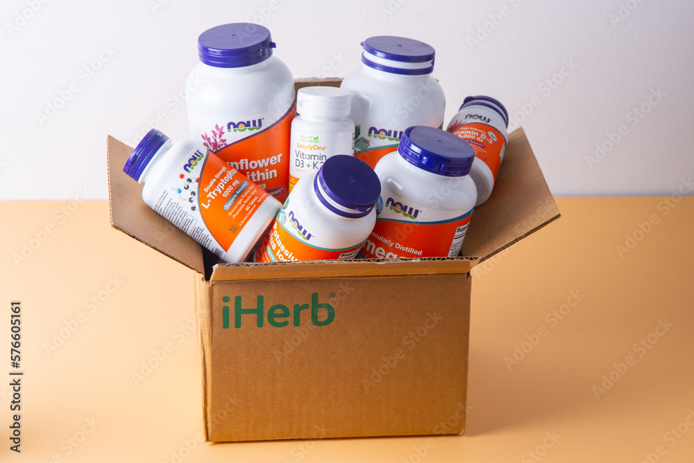 Vitamins, minerals and micronutrients from iHerb box. Lots of different ...