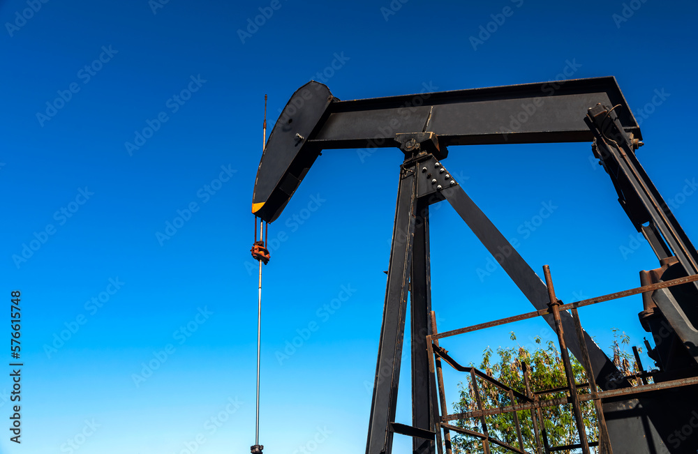 Oil rig well machine digging and pumping fresh oil from ground, Oil Rig ...