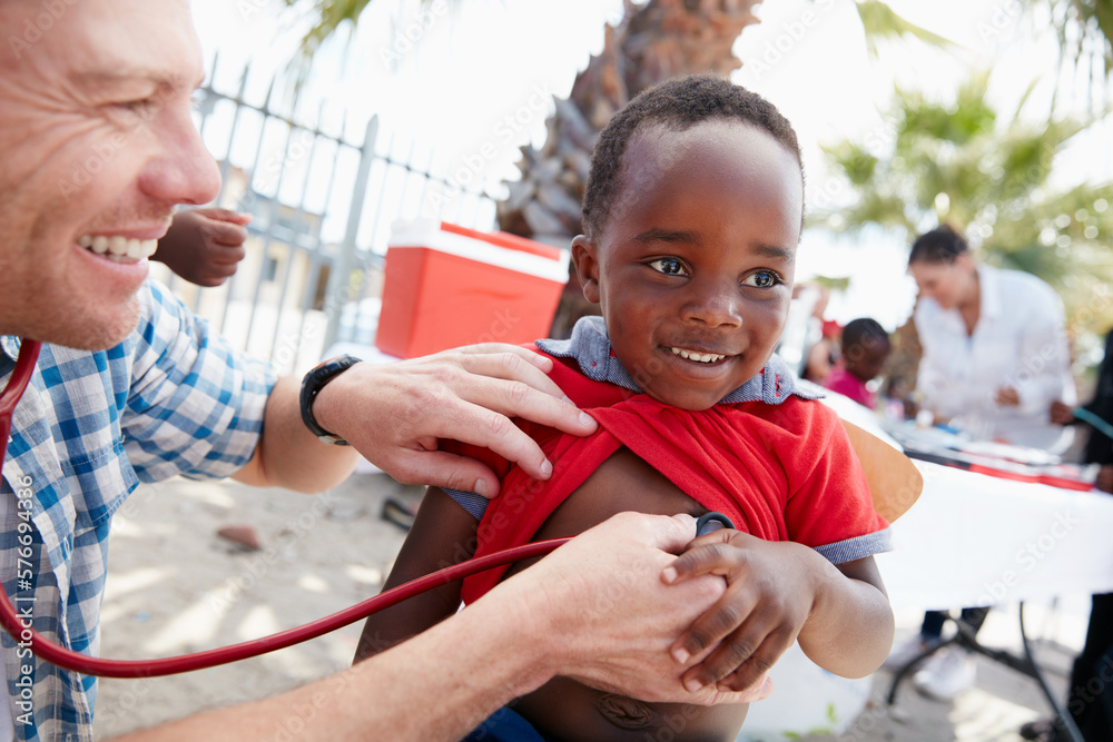 Every child deserves a healthy start in life. Shot of a volunteer ...