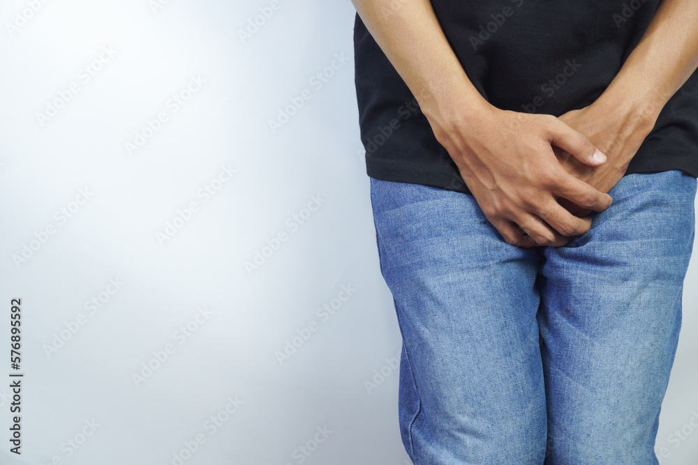 Close up of a man with hands holding his crotch, Urinary Tract ...