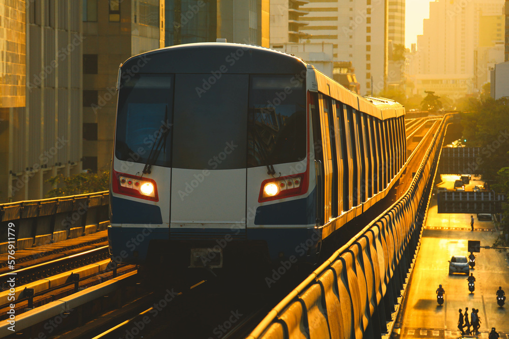 BTS Sky Train is running in downtown of Bangkok. Sky train is fastest ...