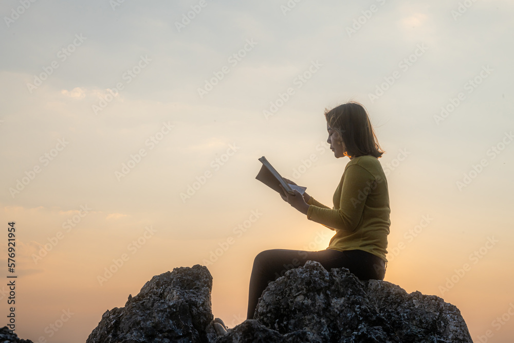 Humans raise their hands in prayer and worship the cross with faith in ...