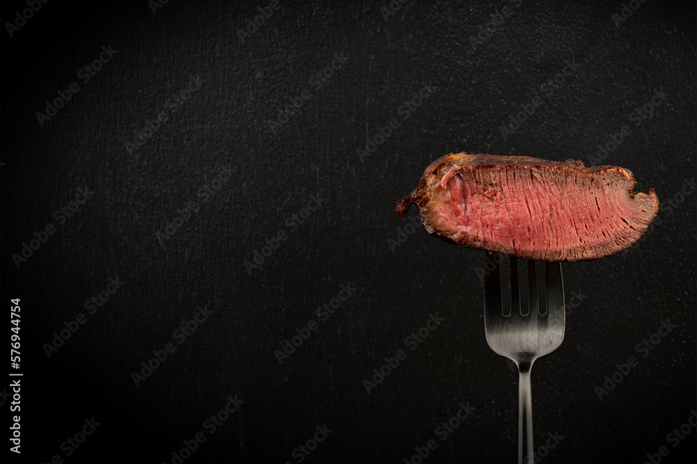 The juicy steak was cooked to perfection and tasted absolutely tasty ...