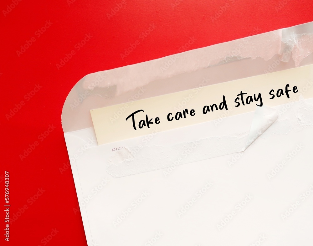 Envelope with handwriting - Take Care and Stay Safe - concept of caring ...