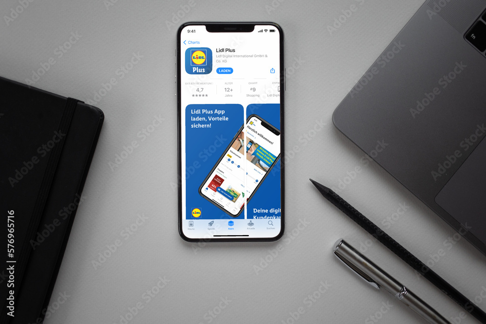 Mobile phone with Lidl Plus App Store screen Stock Photo | Adobe Stock
