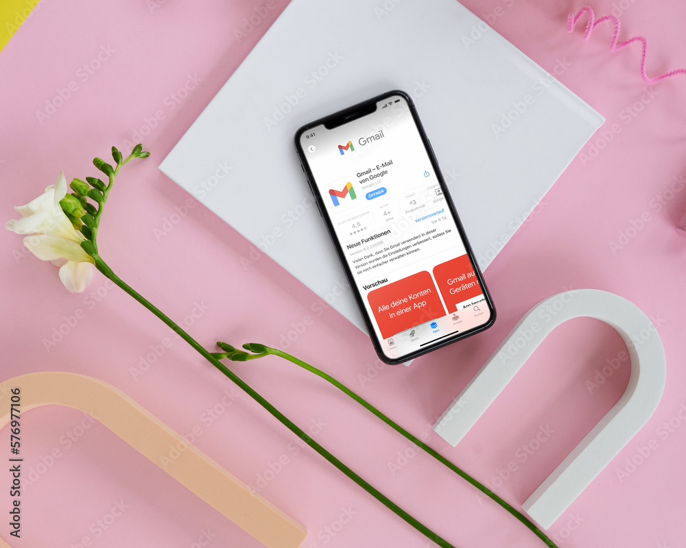 Mobile phone with Gmail App Store screen Stock Photo | Adobe Stock