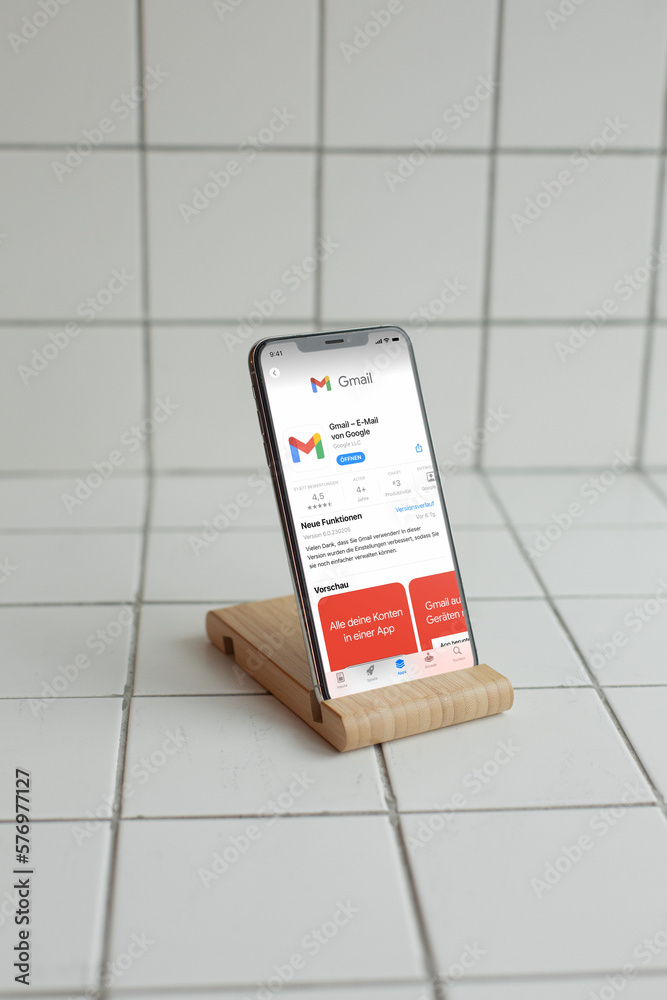 Mobile phone with Gmail App Store screen Stock Photo | Adobe Stock