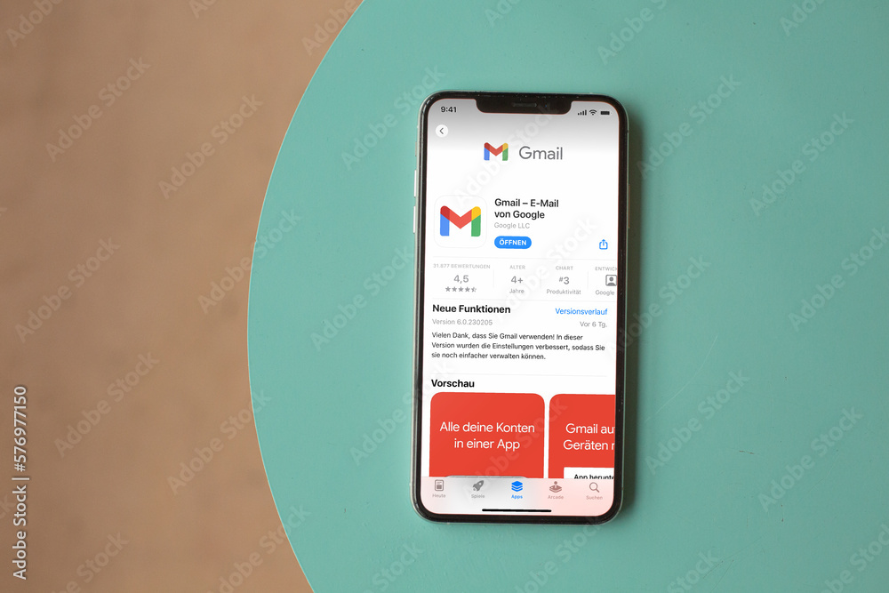 Mobile phone with Gmail App Store screen Stock Photo | Adobe Stock
