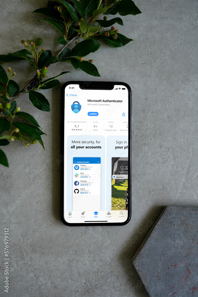 Mobile phone with Microsoft Authenticator App Store screen Stock Photo ...