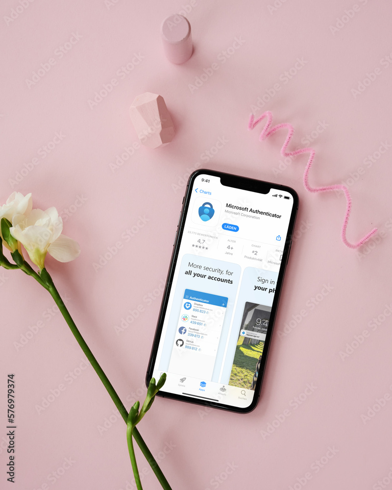 Mobile phone with Microsoft Authenticator App Store screen Stock Photo ...