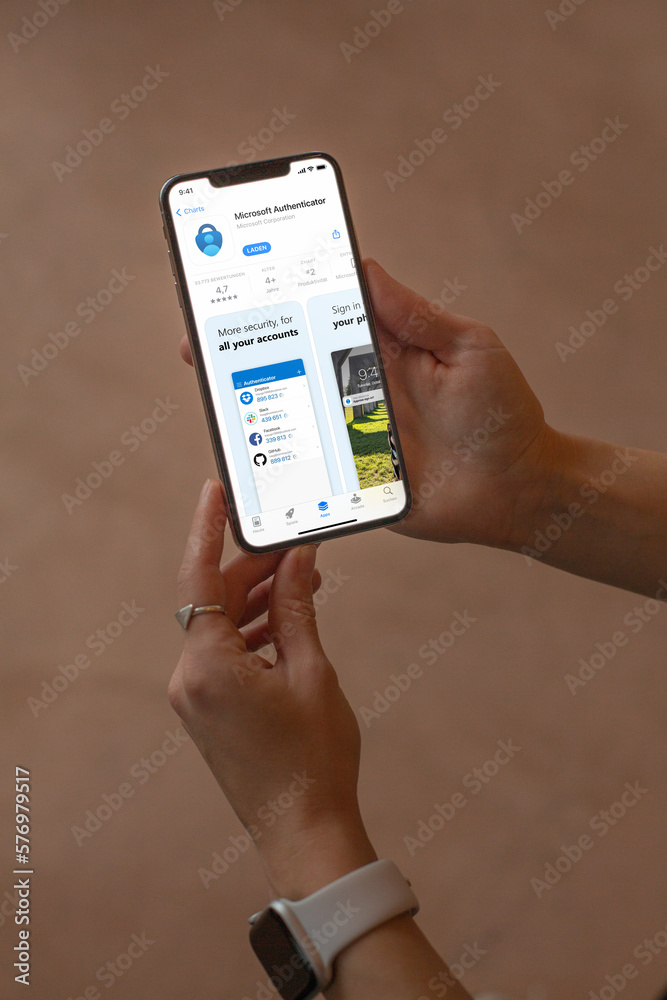 Mobile phone with Microsoft Authenticator App Store screen Stock Photo ...