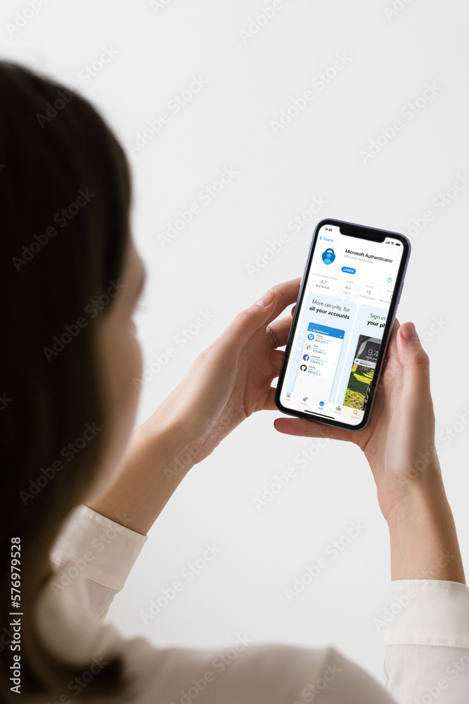 Mobile phone with Microsoft Authenticator App Store screen Stock Photo ...