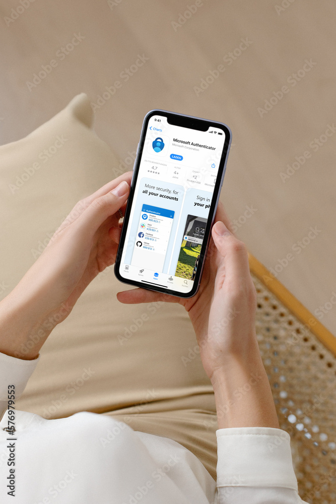 Mobile phone with Microsoft Authenticator App Store screen ภาพถ่ายสต็อก ...