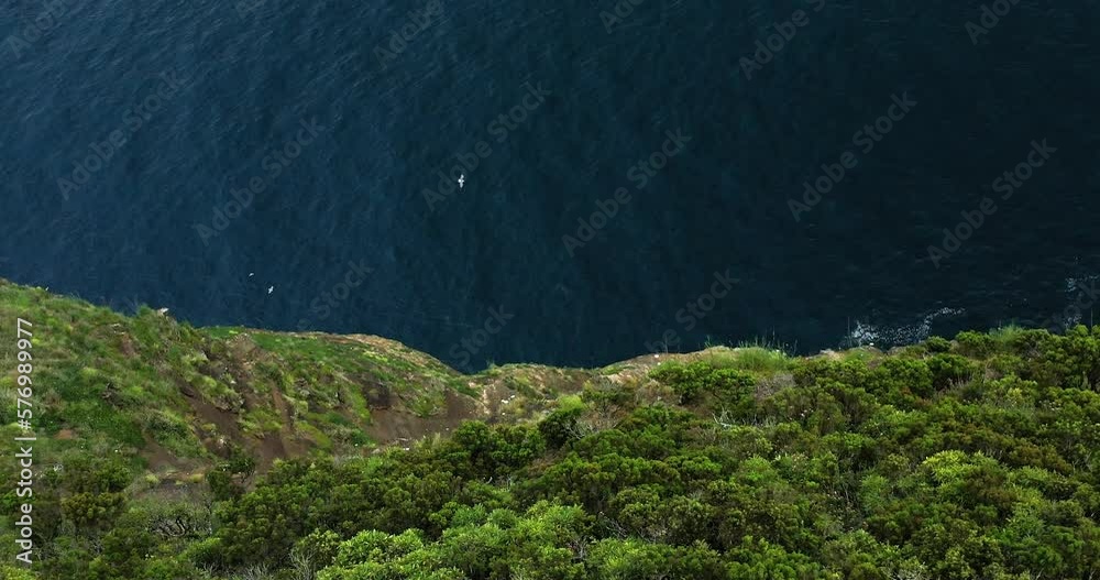 Blue Waters Viewed From The Top Of Rocky Lush Cliffside Hill Of Monte ...