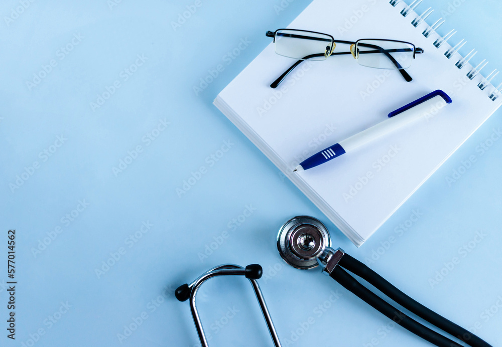 Doctor's set: a notebook for recording patient complaints, a pen, a ...