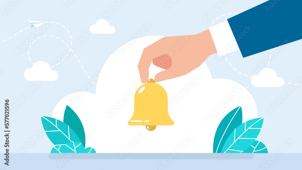 Man holding in his hand the bell. A businessman is ringing small bell ...