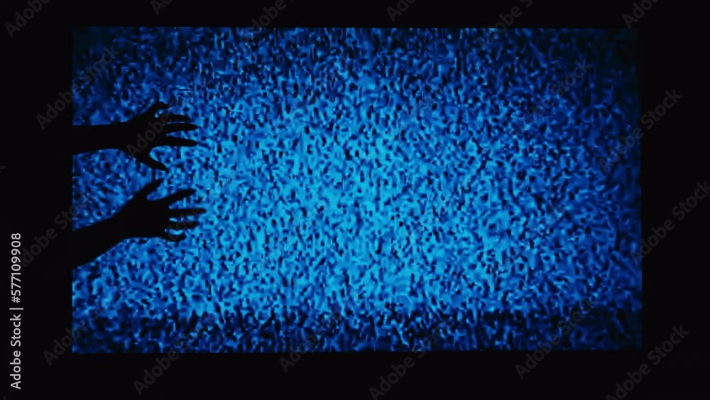 Hands on the background of the noise of the TV scary scene for a horror ...