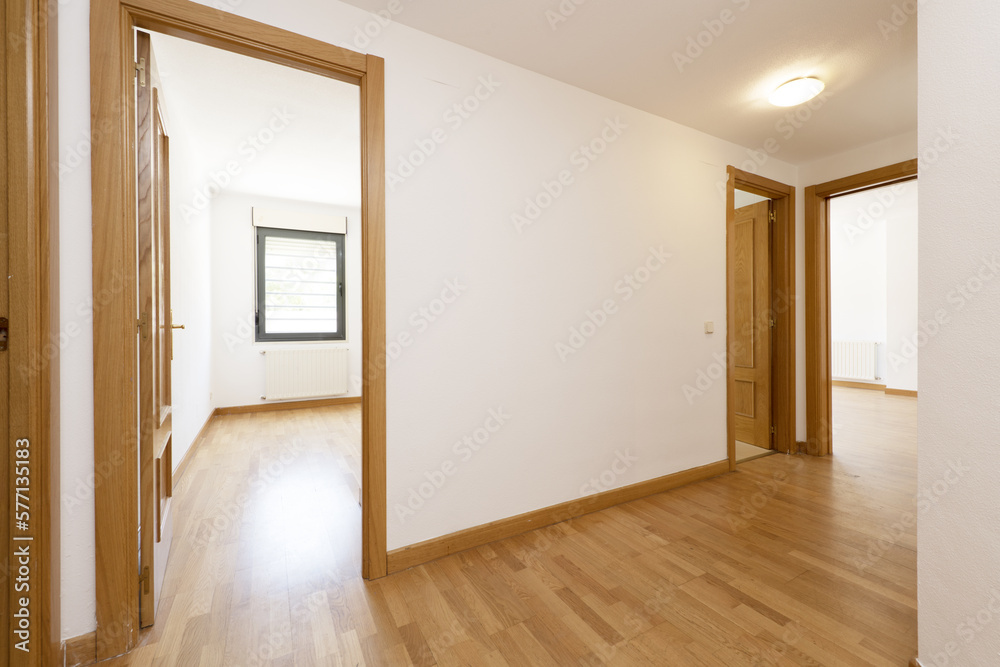Distributor corridor of a house with floating oak wood floors and ...