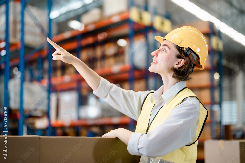 smart woman worker wearing working suite dress and safety helmet at ...