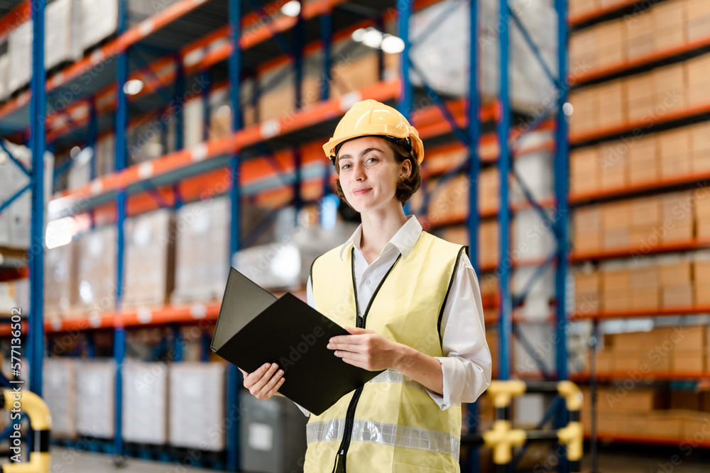 smart woman worker wearing working suite dress and safety helmet at ...
