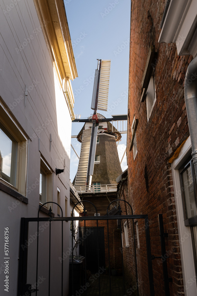 typical Dutch grain mill windmill in Winsum Holland. De Vriendschap is ...