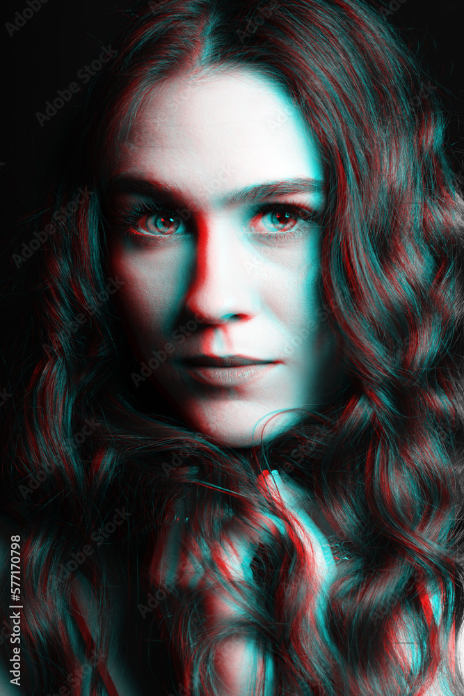 Beautiful woman with long wavy hair close-up studio portrait. Model ...